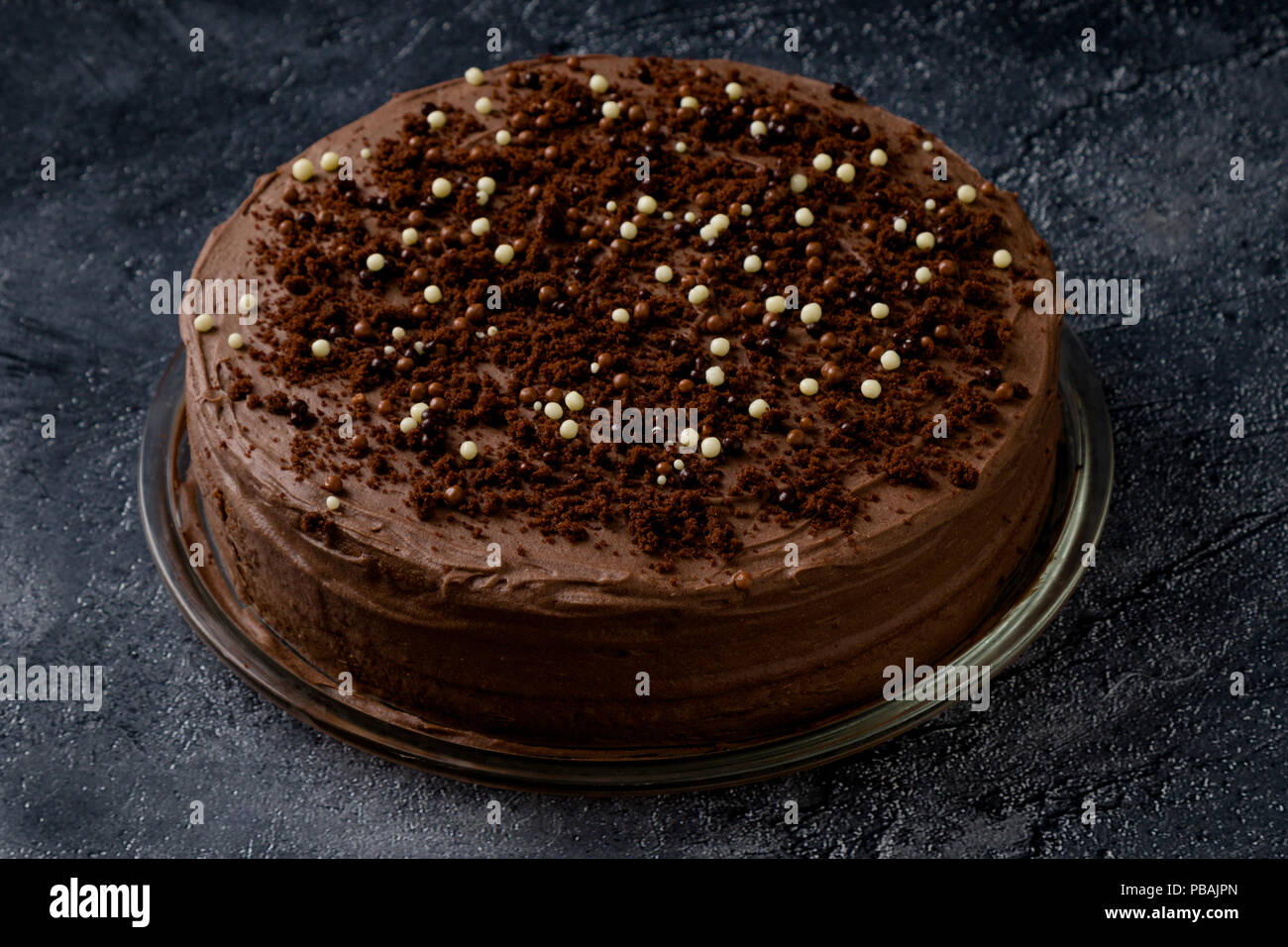 Sweet dark brown chocolate cake with decoration Stock Photo - Alamy