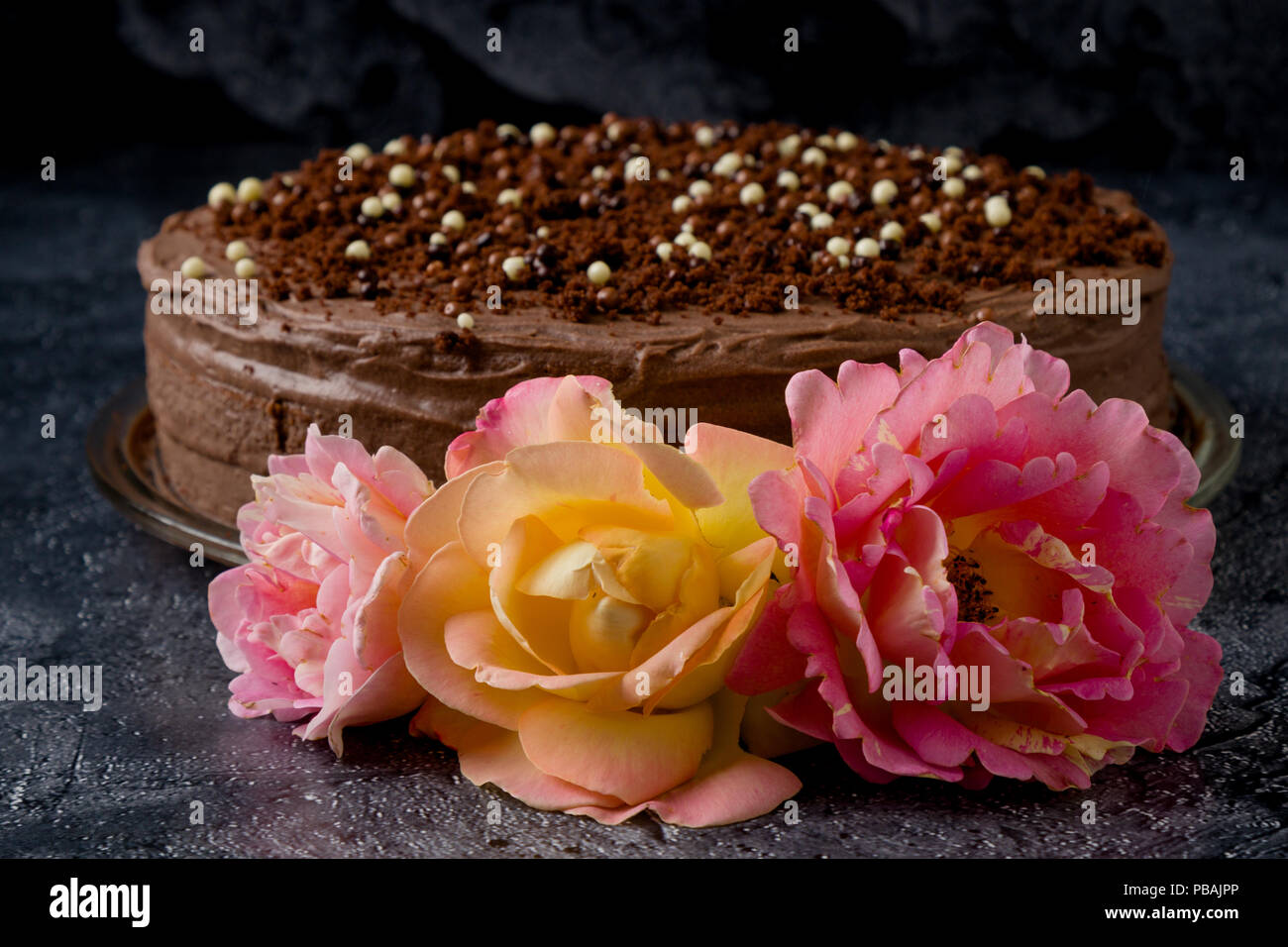 Sweet dark brown chocolate cake with decoration Stock Photo - Alamy