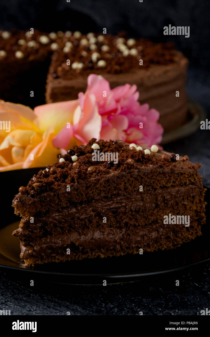 Sweet dark brown chocolate cake with decoration Stock Photo - Alamy
