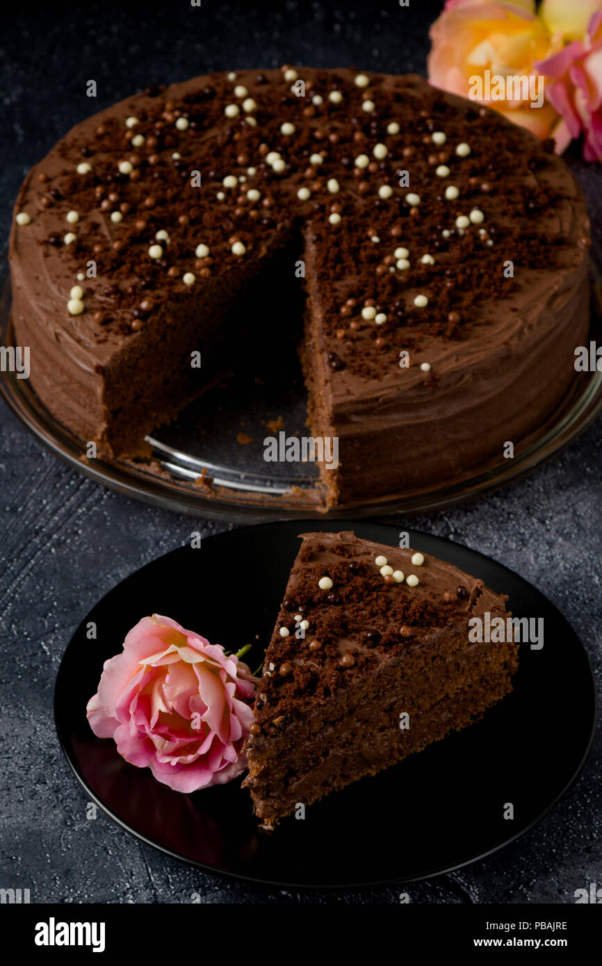 Sweet dark brown chocolate cake with decoration Stock Photo - Alamy