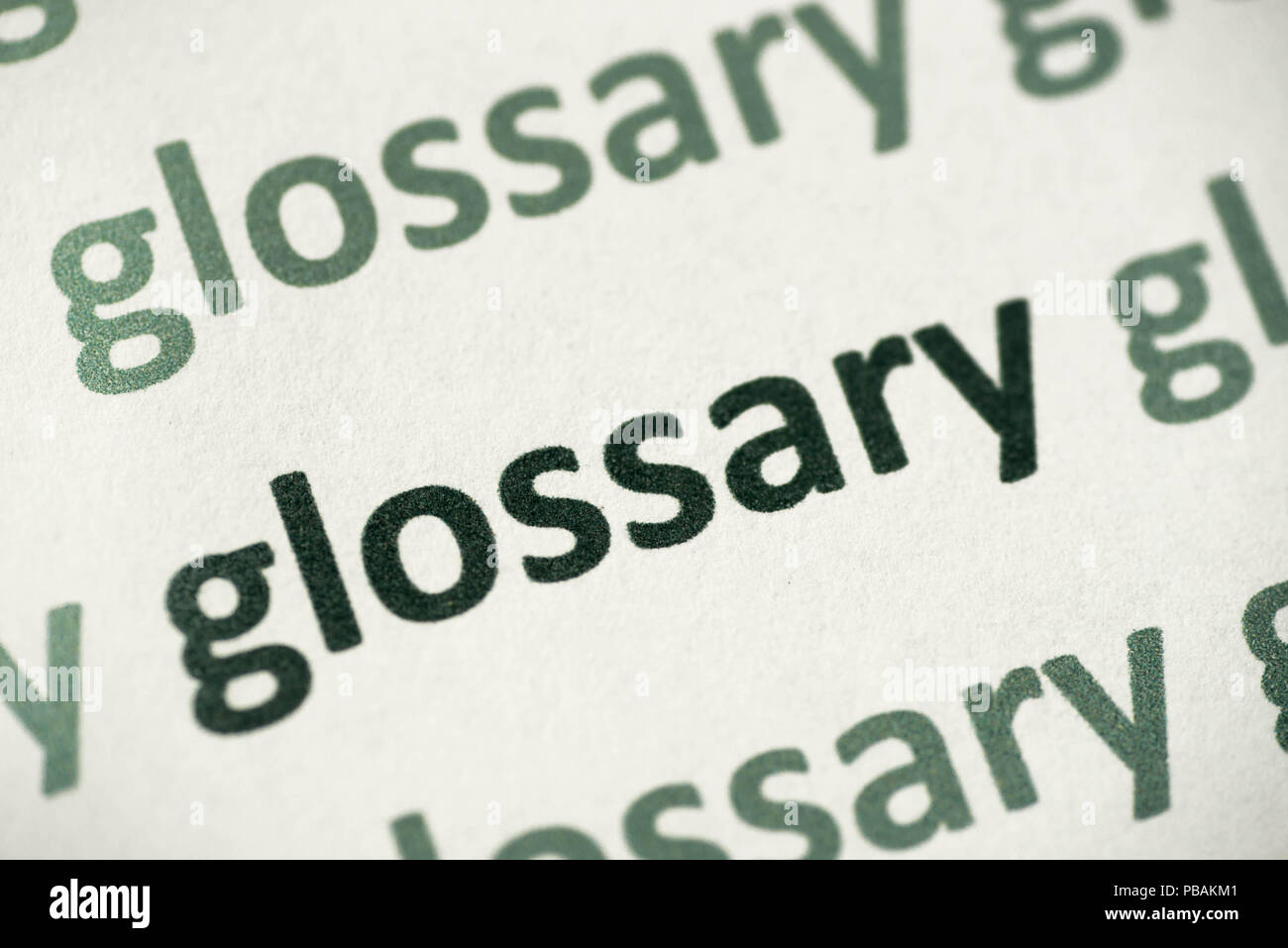 word glossary printed on white paper macro Stock Photo - Alamy