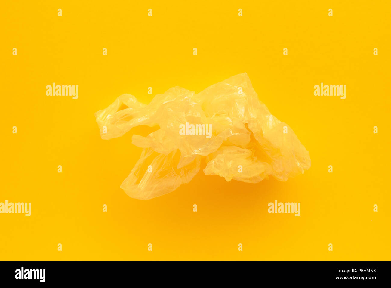 Yellow plastic bag, environmental pollution conceptual background image ...