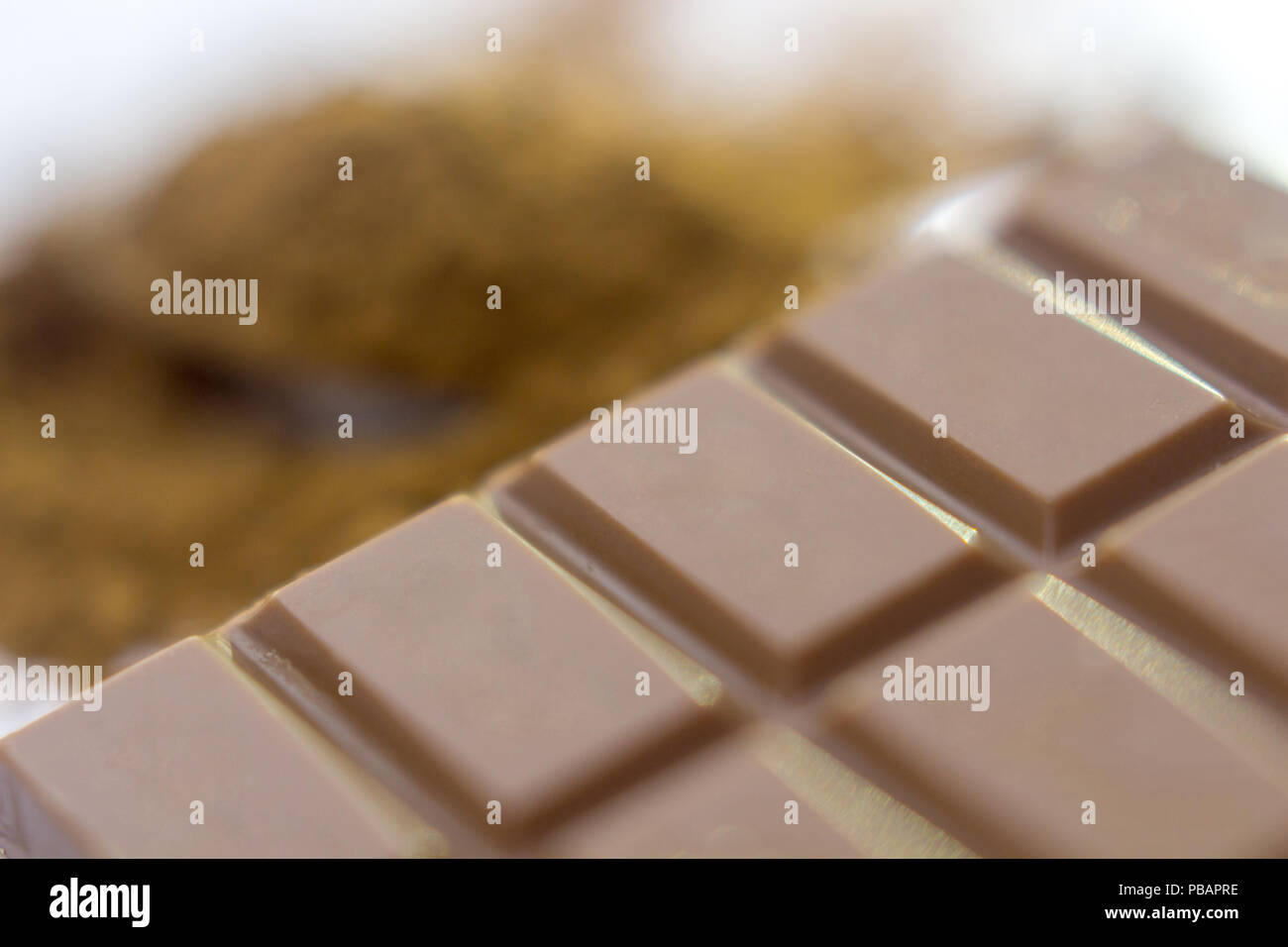 Chocolate bar pieces and cocoa powder on white background. Brown ...