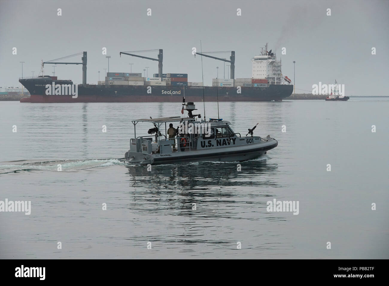 U.S. Navy Patrol Boat, Patrols The Port Of Los Angeles, An Arriving ...