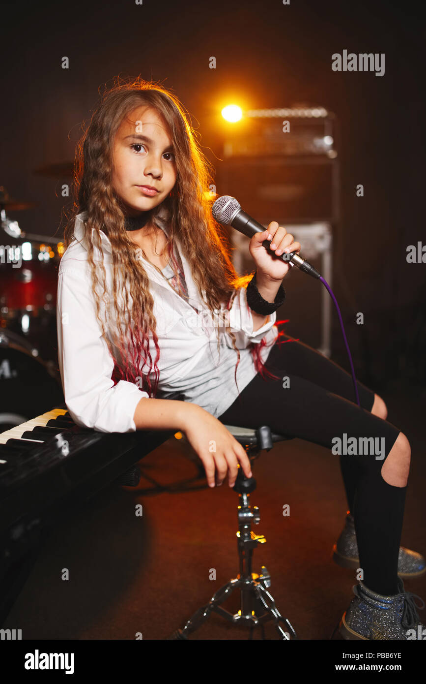 little beautiful girl singing in recording studio Stock Photo - Alamy