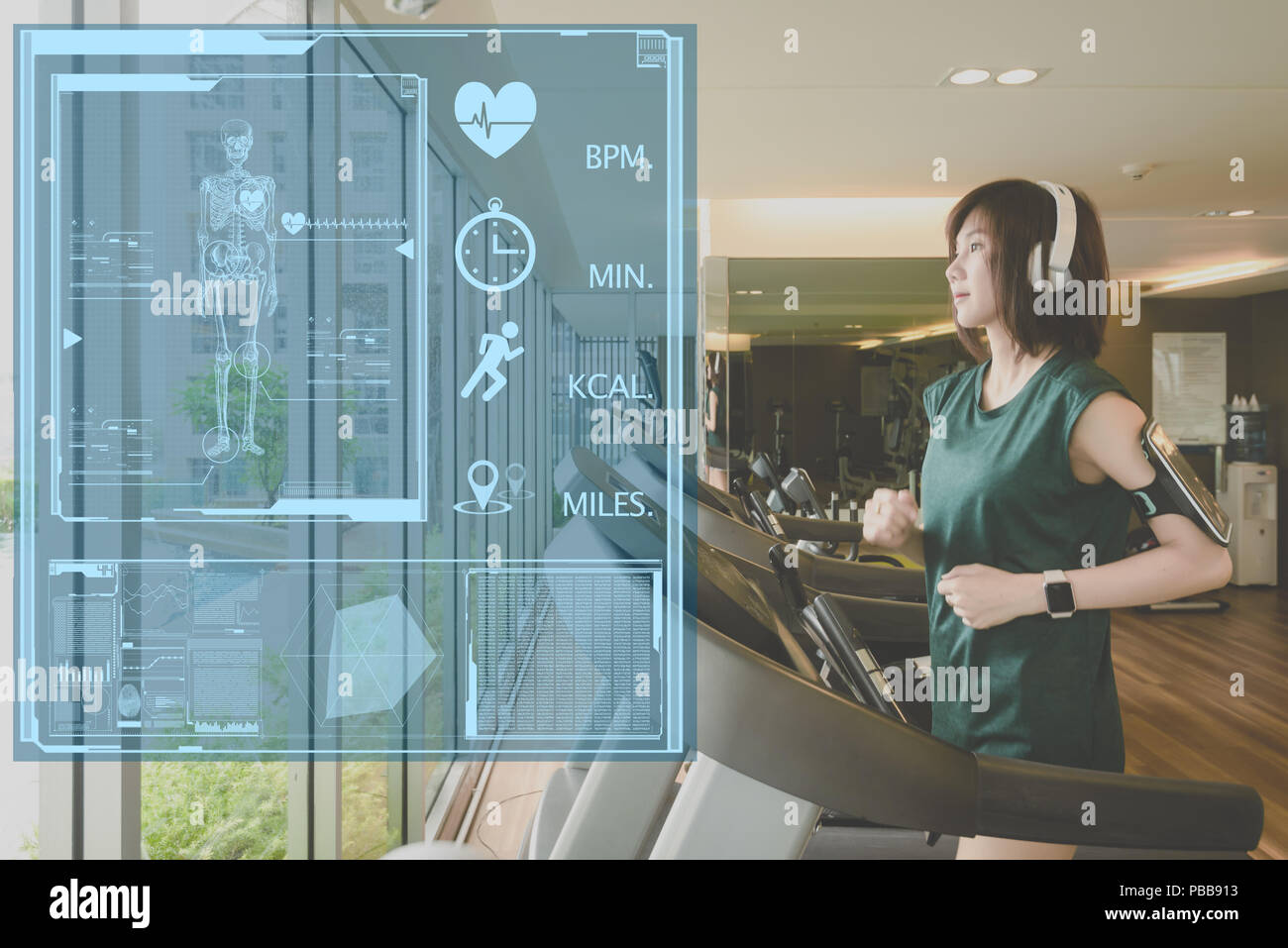 Woman run on running machine with technology interface of details about ...