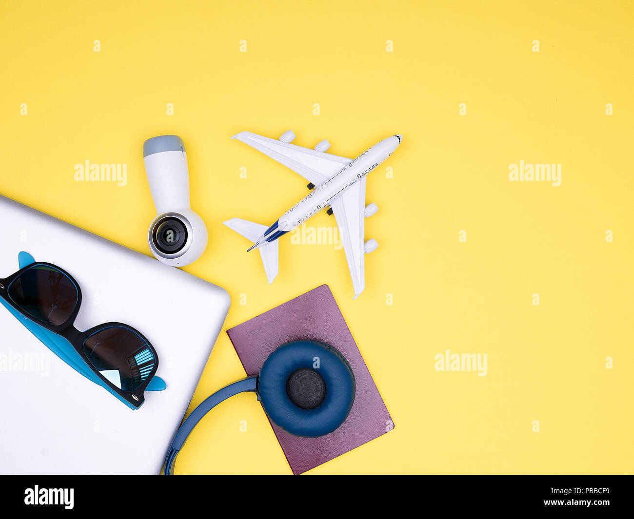 flat lay of traveler kit on yellow background. top view studio photo ...