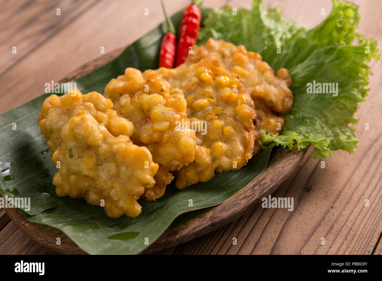 indonesian traditional bergedel or bakwan jagung Stock Photo - Alamy