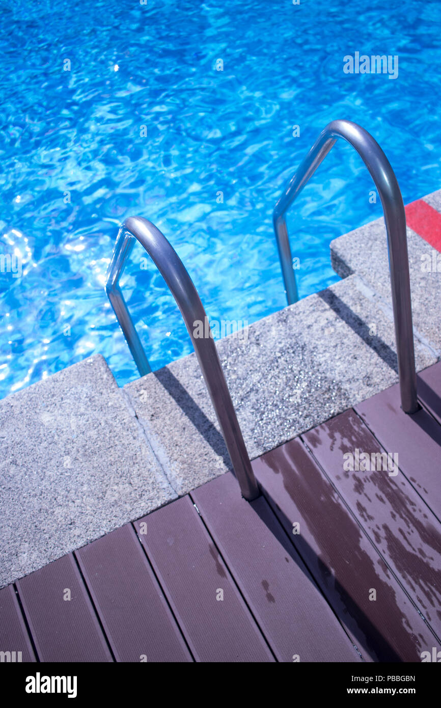 Summer outdoor swimming pool in luxury resort hotel garden Stock Photo ...
