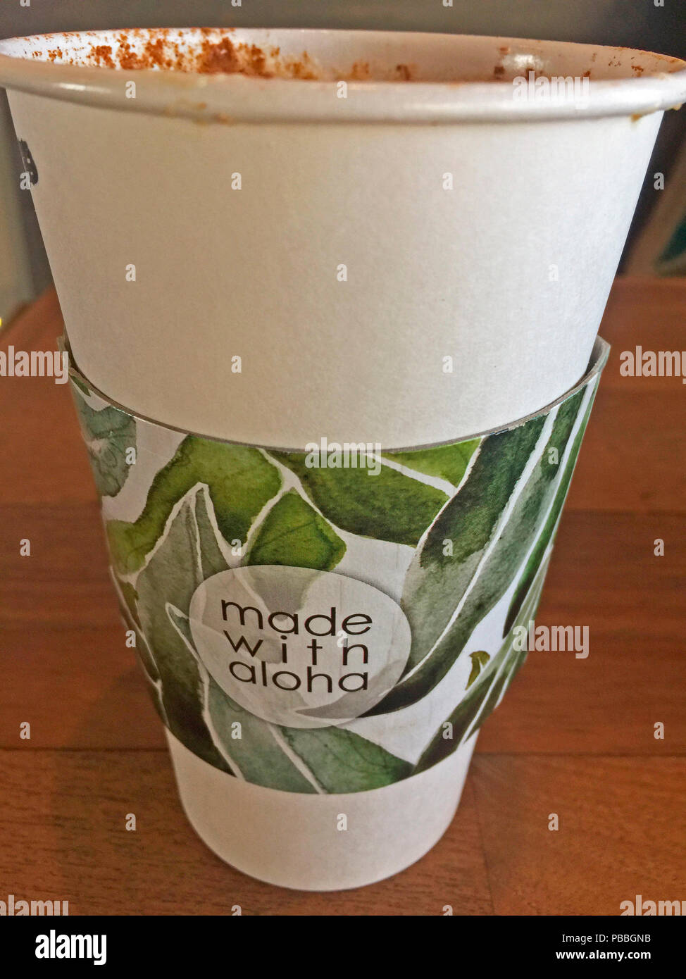 Premium coffee, grown, roasted, and brewed in Hawaii, served in a cup ...