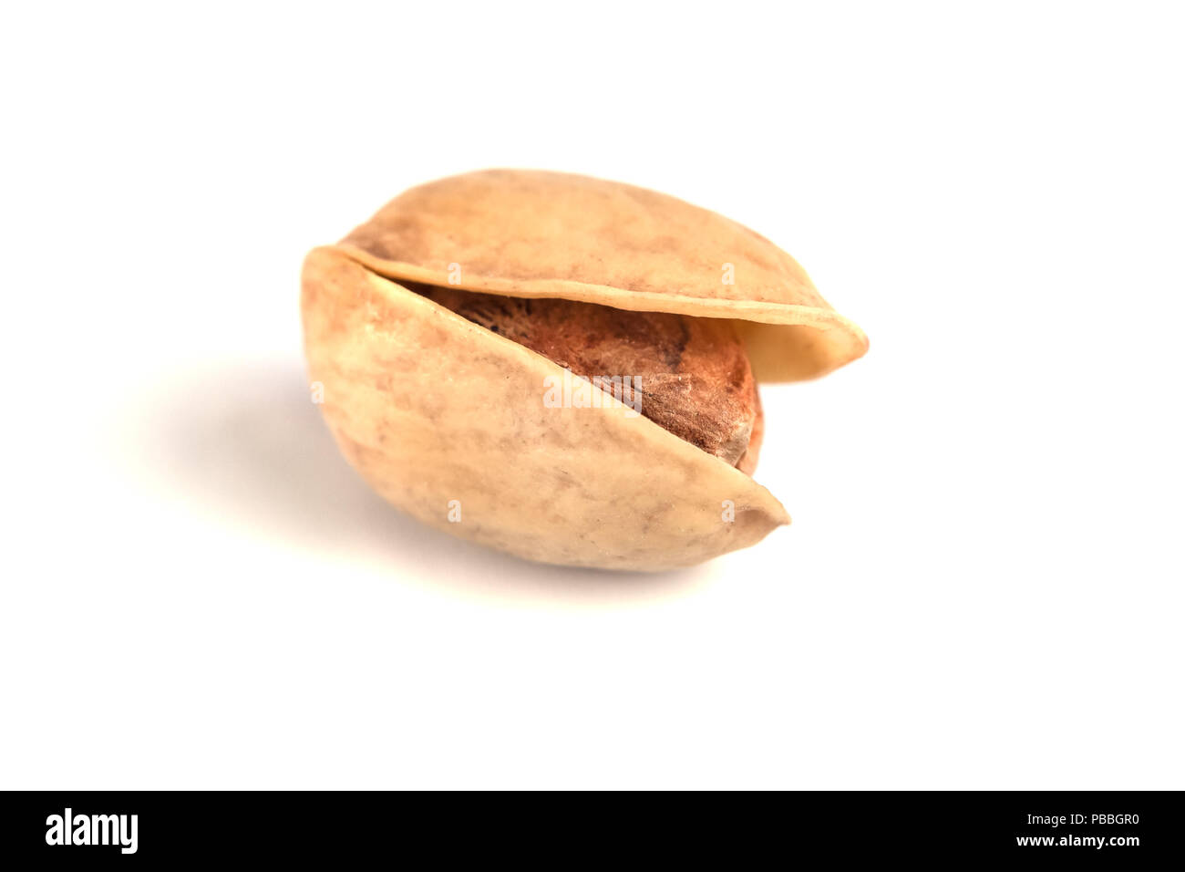 salted pistachio nut isolated on a white background Stock Photo - Alamy