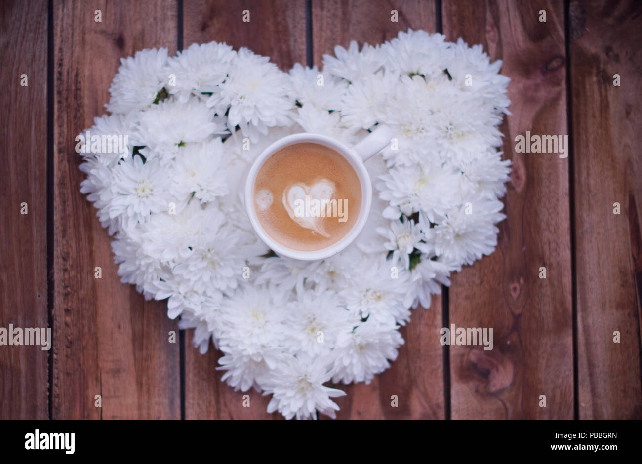 espresso in colors with heart on a wooden background Stock Photo - Alamy
