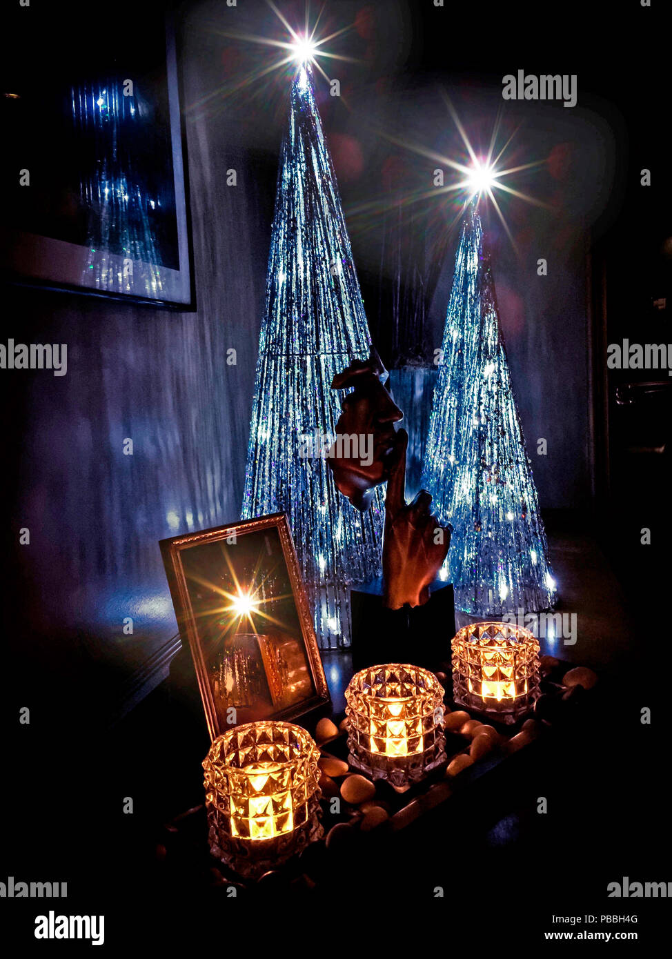 Three low candles and three stars at the top of the crystal cliffs in a ...