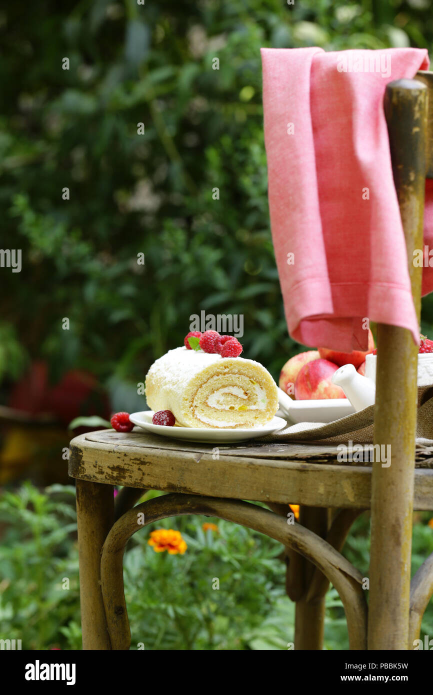 biscuit roll dessert with fresh berries, rustic style Stock Photo - Alamy