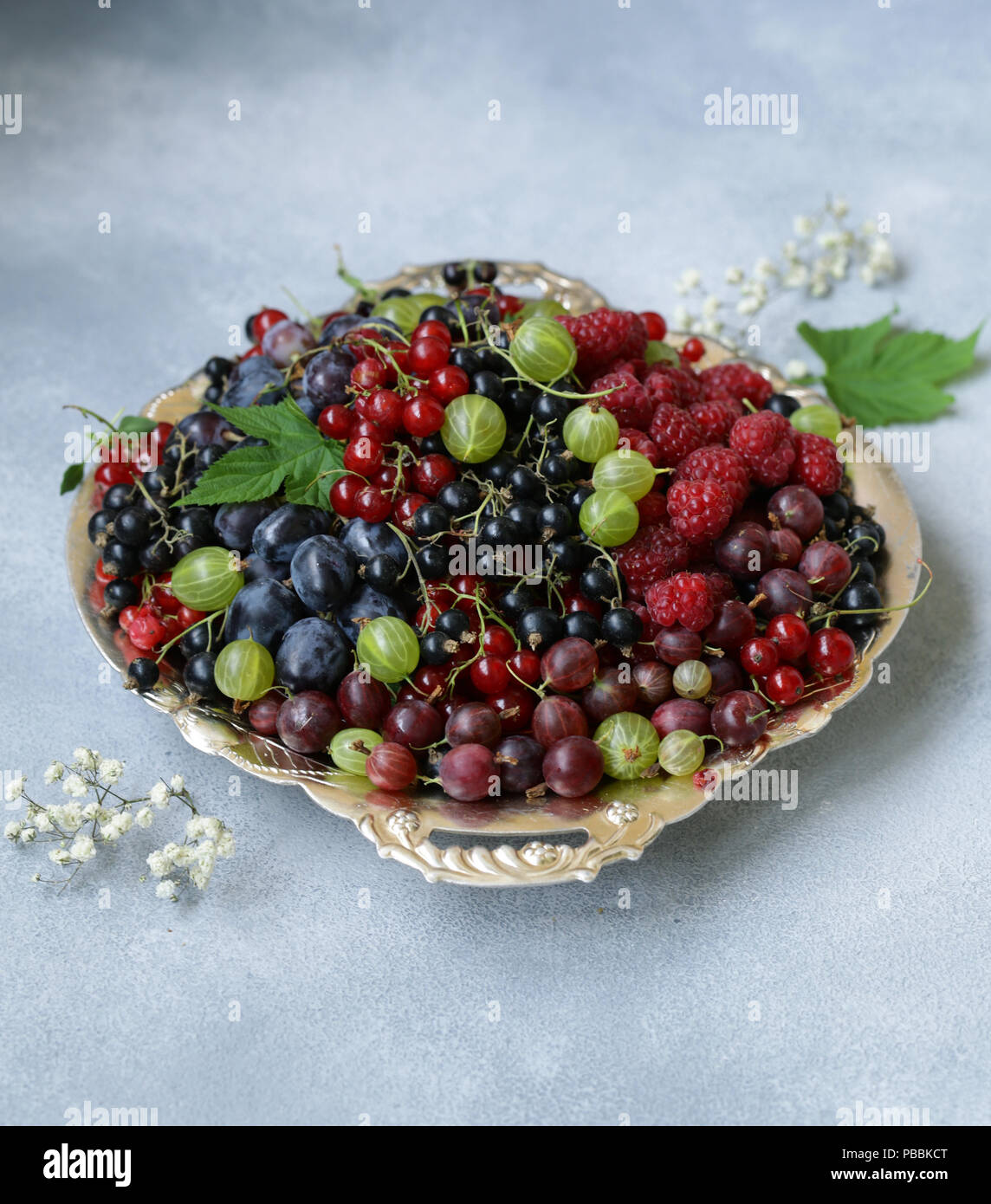 ripe organic mix berries rustic still life Stock Photo - Alamy