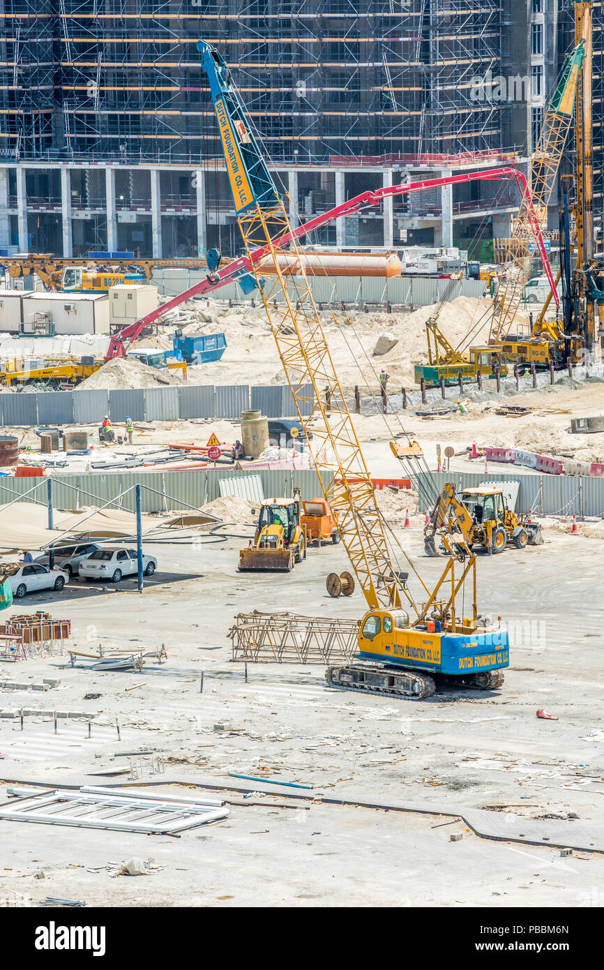 Cranes at construction site Stock Photo - Alamy