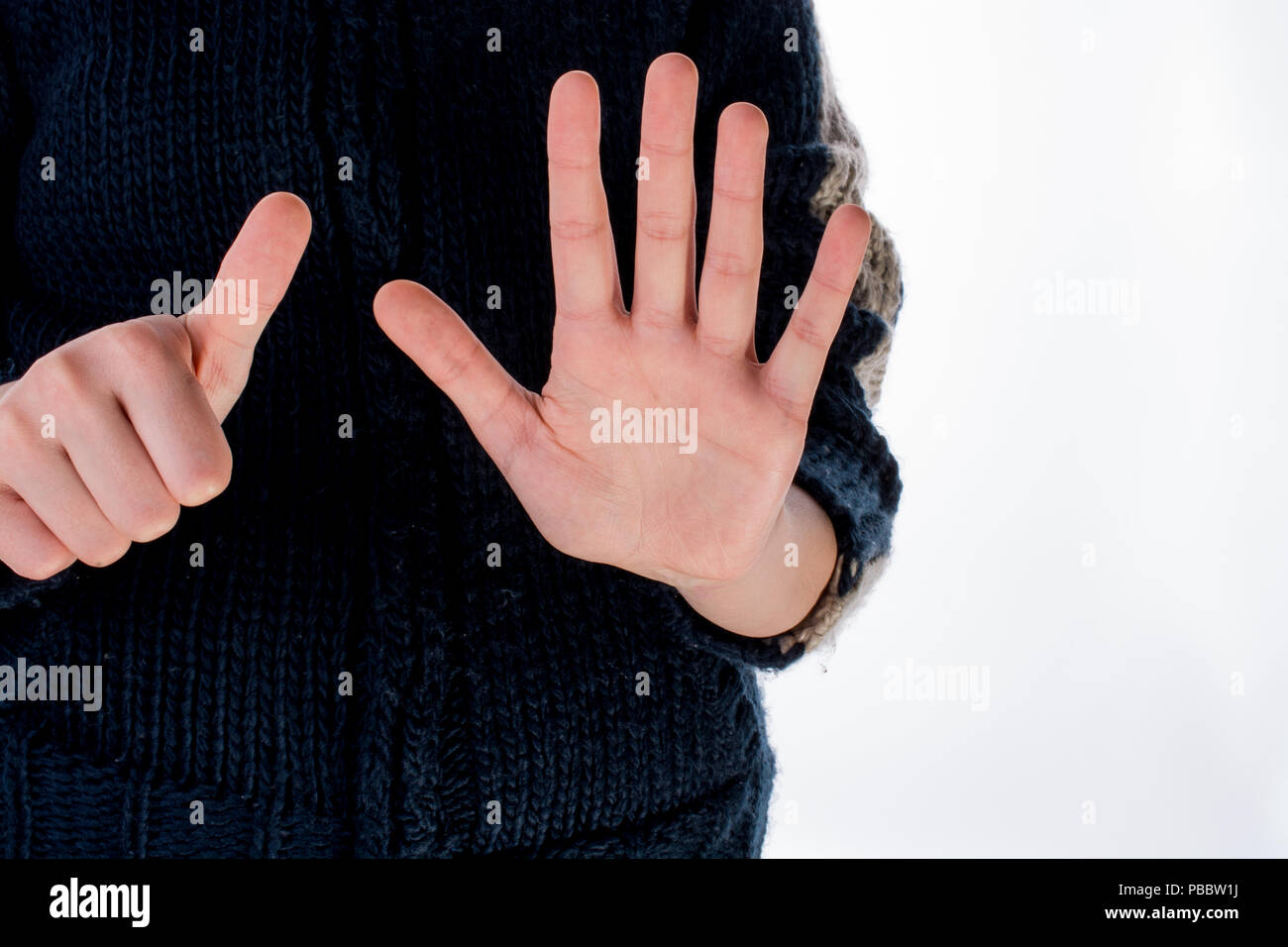 Hand making a gesture on a white background Stock Photo - Alamy