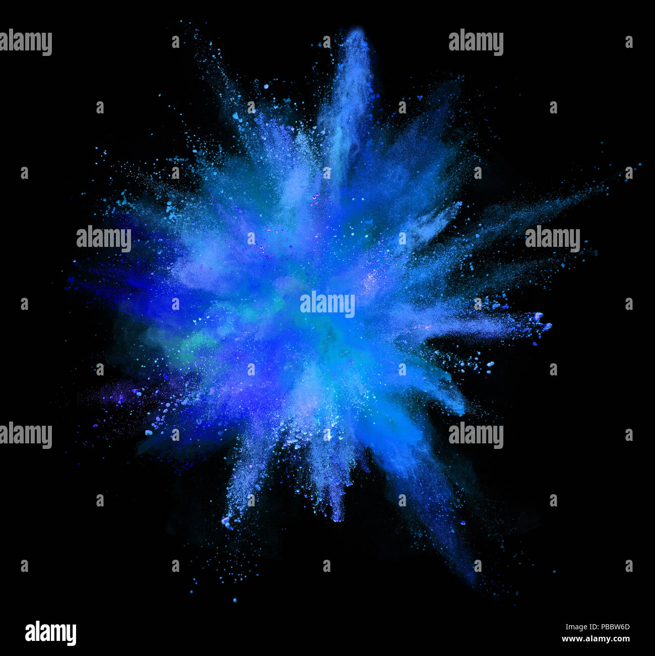 Explosion of coloured powder isolated on black background. Abstract ...