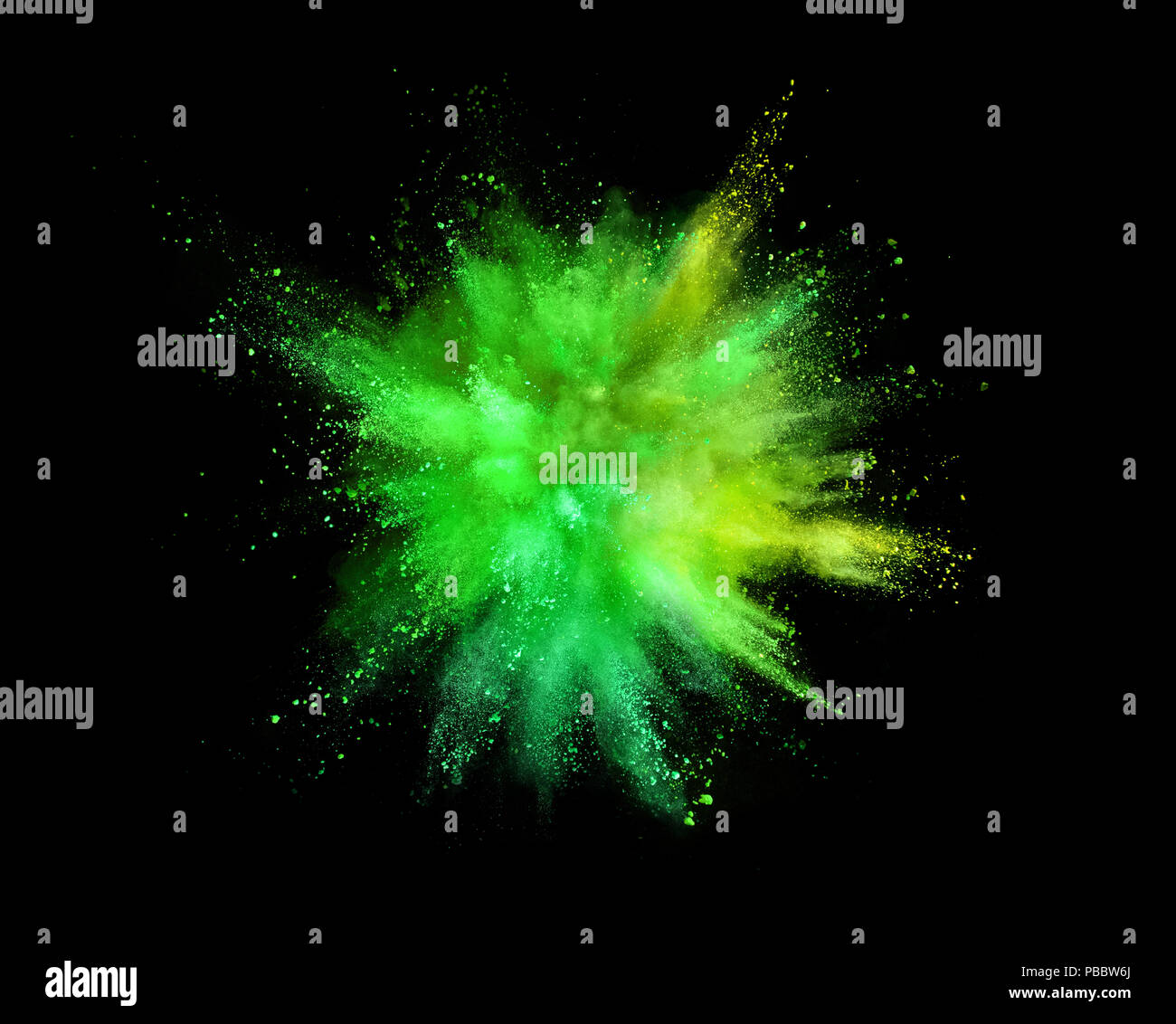 Explosion of coloured powder isolated on black background. Abstract ...
