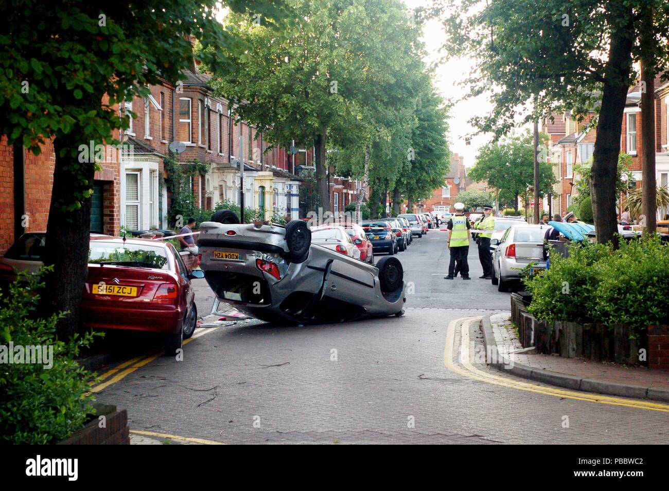 Upside down car after an accident Stock Photo - Alamy