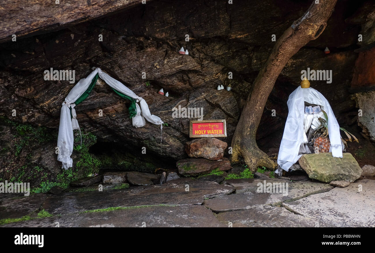 Paro, Bhutan - Sep 3, 2015. Holy water in the cave near Taktshang ...
