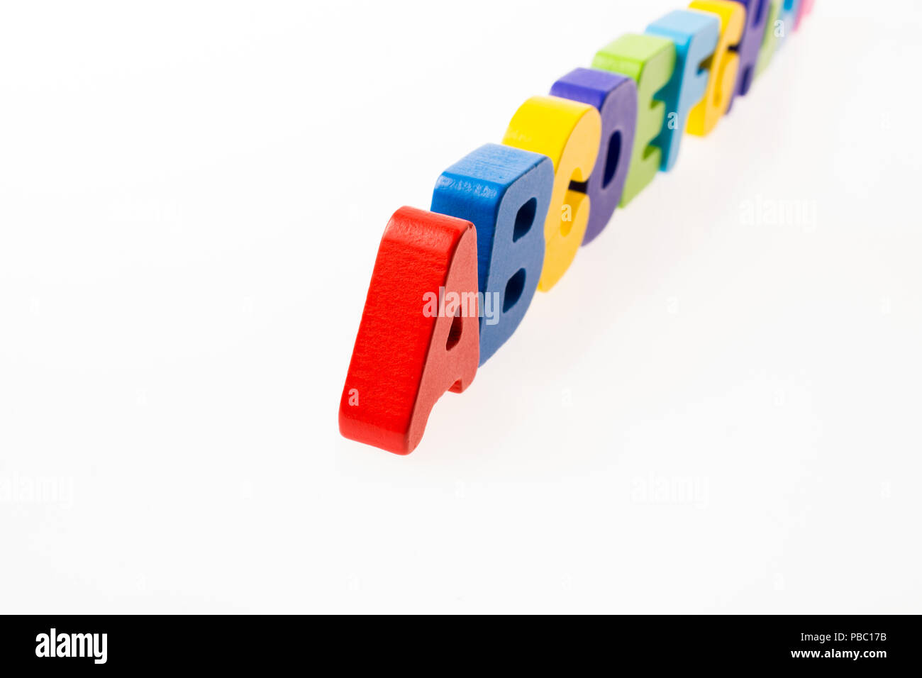 Letter cubes of Alphabet made of wood Stock Photo - Alamy