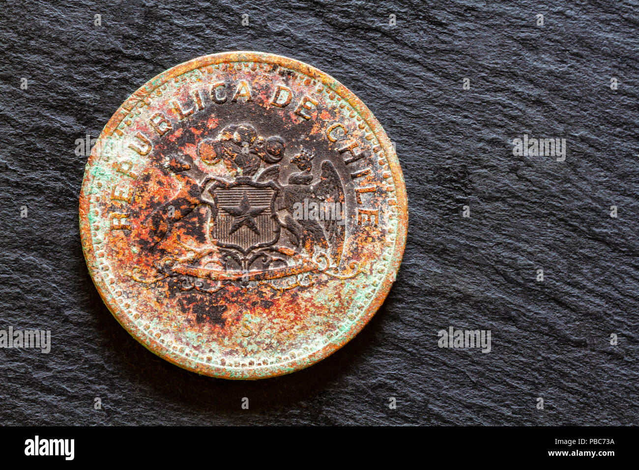 Corroded coin of 100 Chilean pesos from 1981 Stock Photo - Alamy