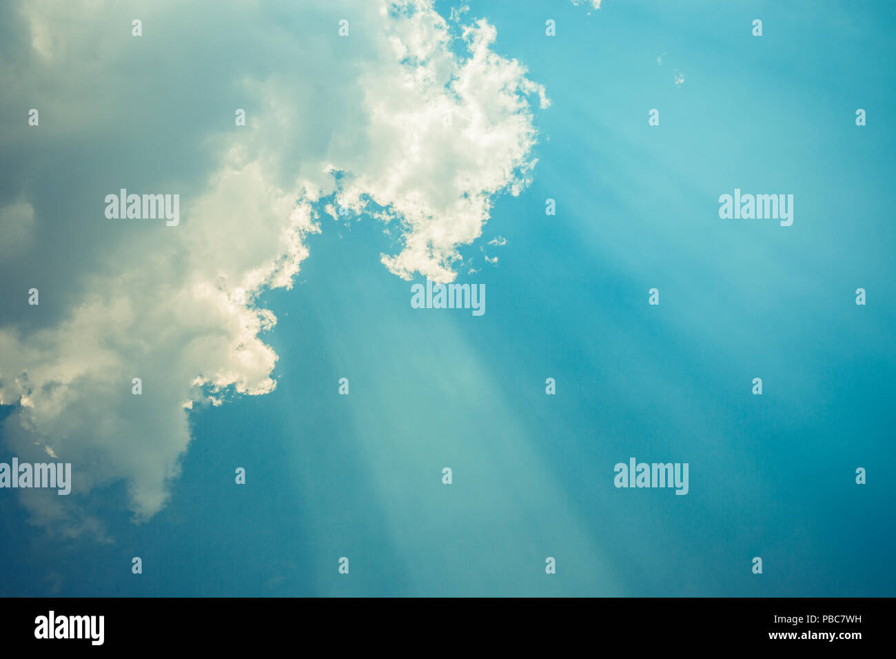 Sky with clouds and sun rays from the bottom Perfect Stock Photo - Alamy