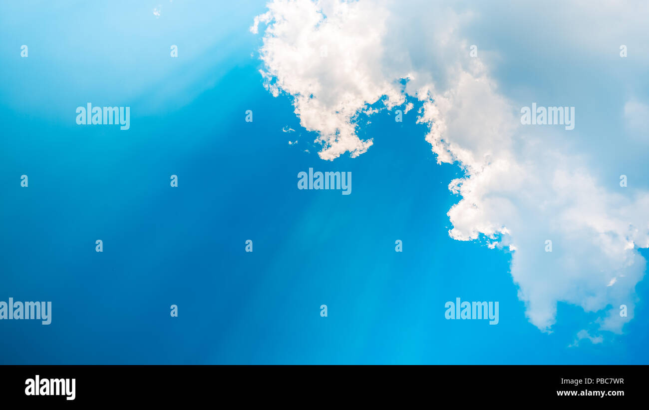Sky with clouds and sun rays from the bottom Perfect Stock Photo - Alamy