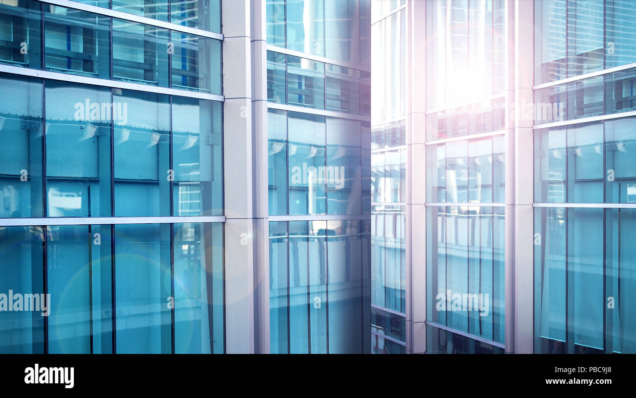 Close up of a modern business building blue colortone Stock Photo - Alamy