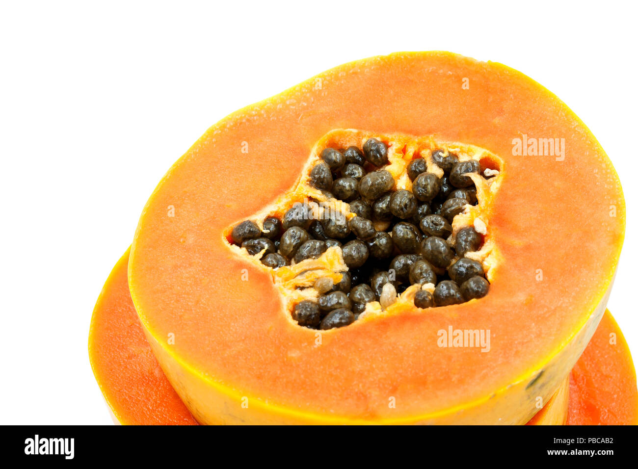 Ripe papaya isolated on white background Stock Photo - Alamy