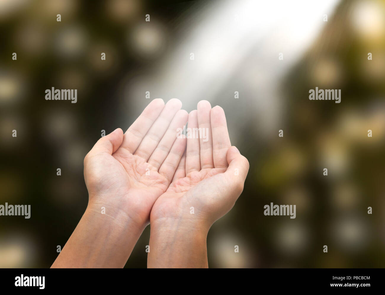 woman giving or holding hands, glowing lights on hand Concept Stock ...