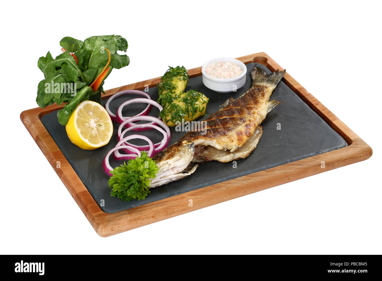 Grilled fish with vegetables Stock Photo - Alamy