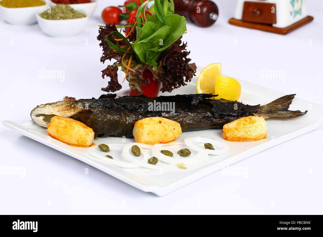 Grilled fish with vegetables Stock Photo - Alamy