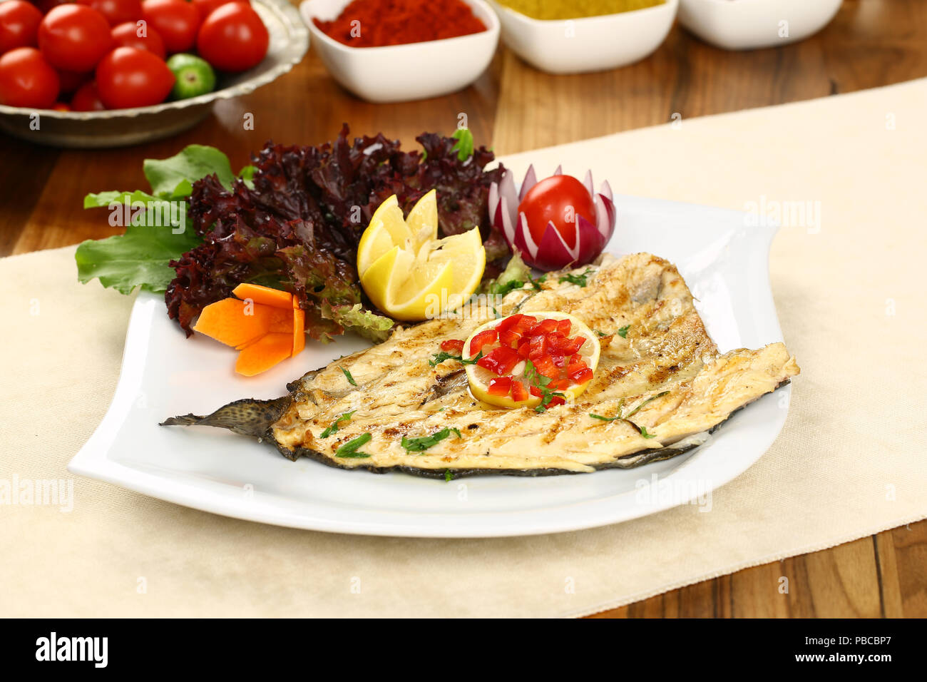 Grilled fish with vegetables Stock Photo - Alamy