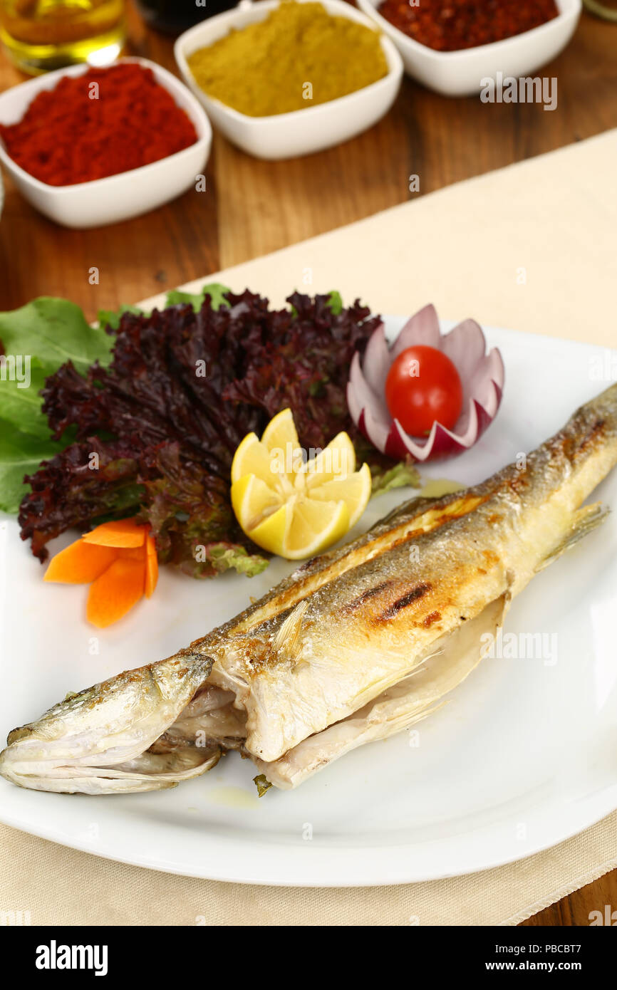 Grilled fish with vegetables Stock Photo - Alamy