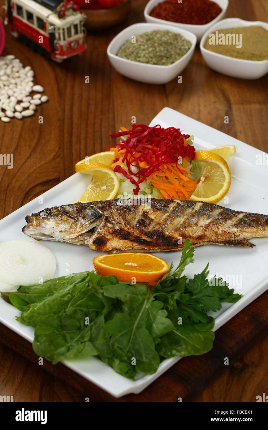Grilled fish with vegetables Stock Photo - Alamy