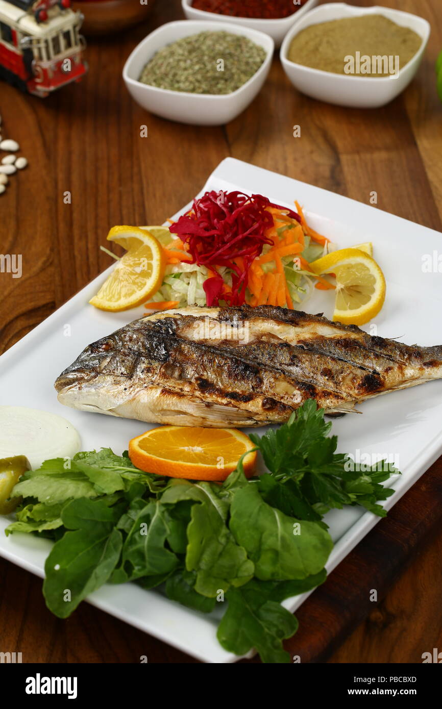 Grilled fish with vegetables Stock Photo - Alamy