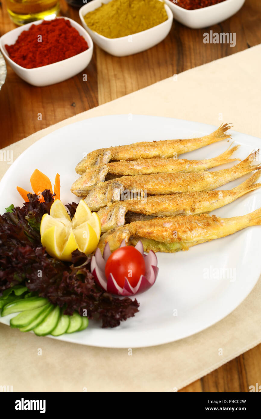 Grilled yellow fish with vegetables Stock Photo - Alamy