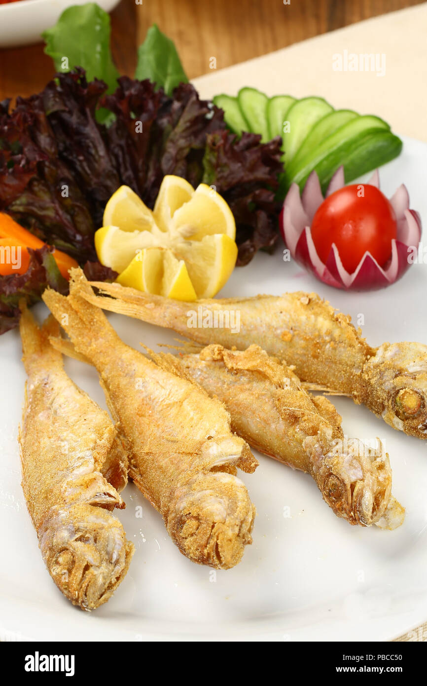 Grilled yellow fish with vegetables Stock Photo - Alamy