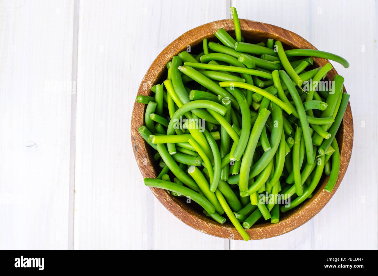 Healthy natural seasonal food. Arrows young fresh garlic chopped into ...