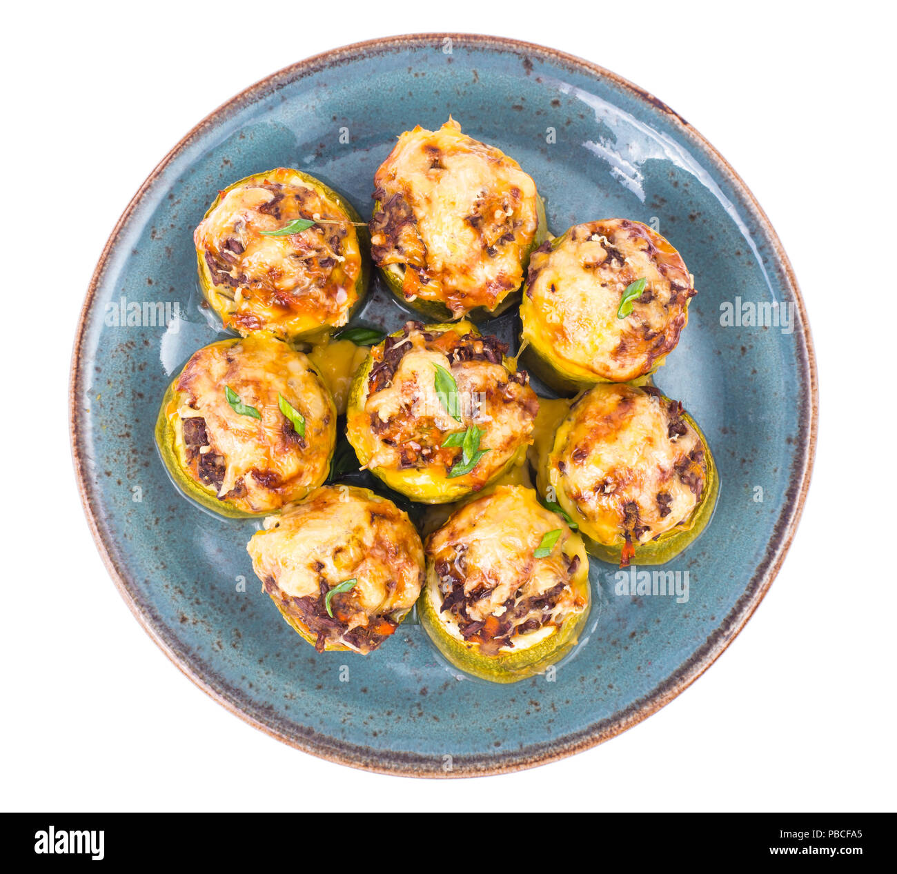 Zucchini stuffed with minced meat and vegetables. Studio Photo Stock ...