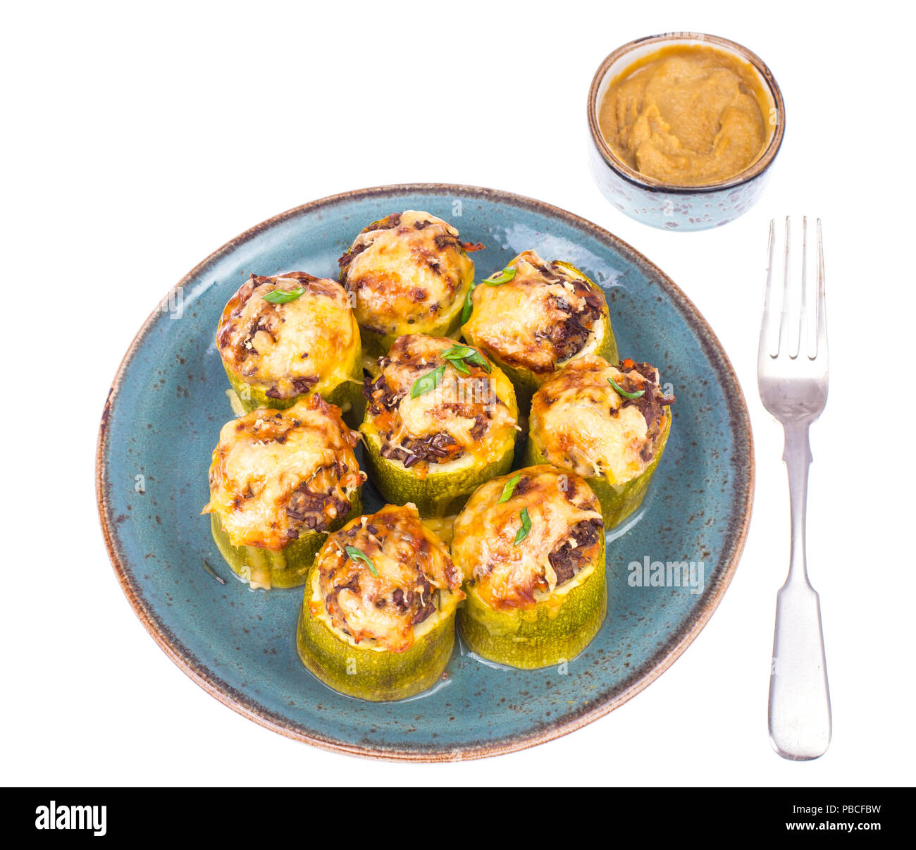 Zucchini stuffed with minced meat and vegetables. Studio Photo Stock ...