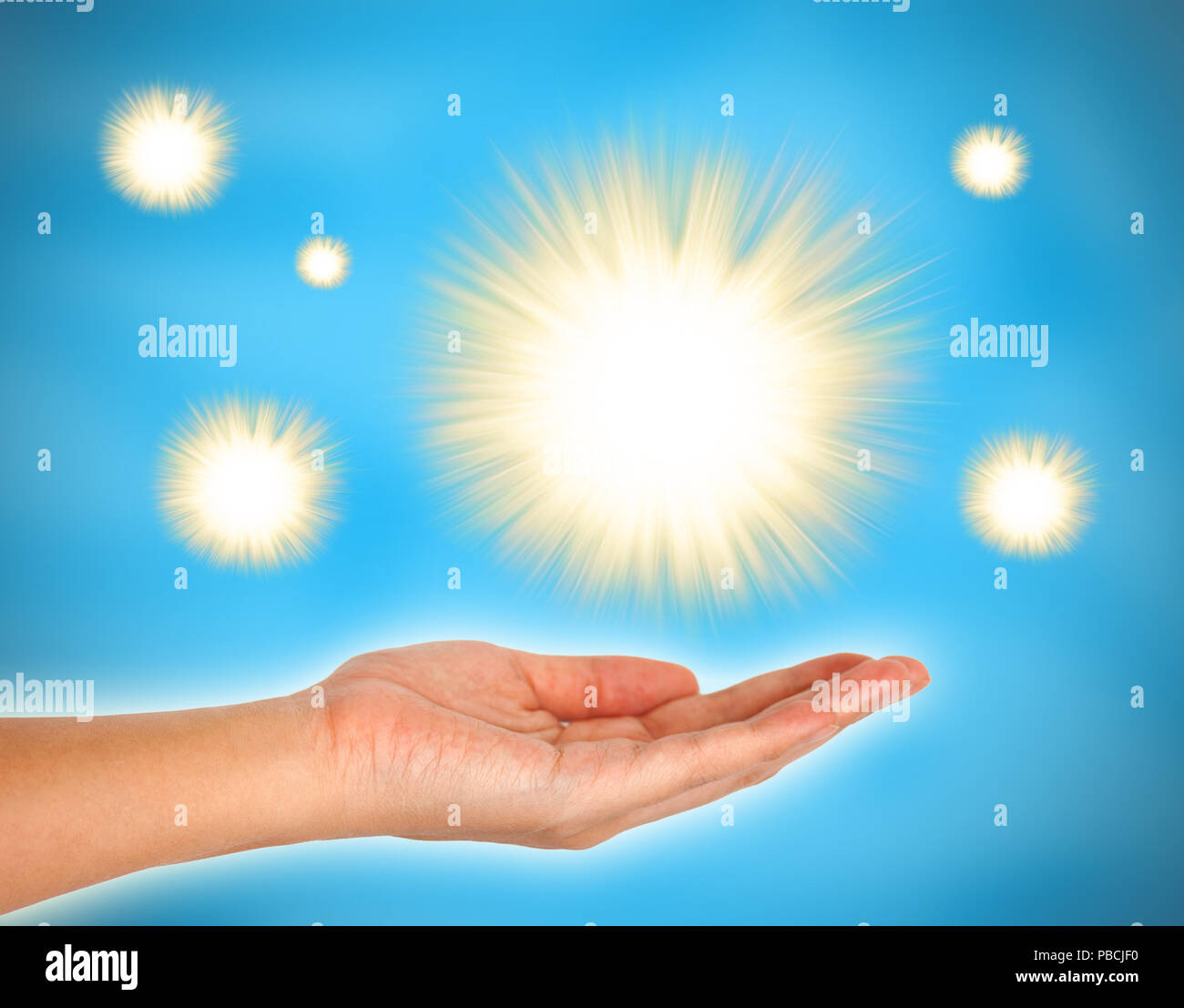 glowing lights on hand Stock Photo - Alamy