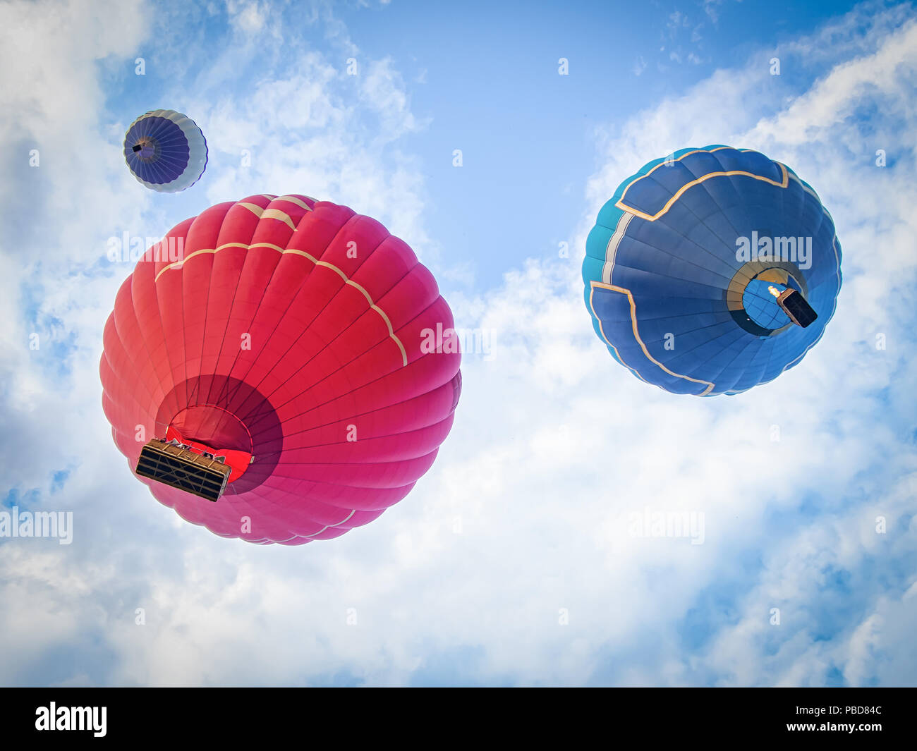 Three balloons bottom view on sky background Stock Photo - Alamy