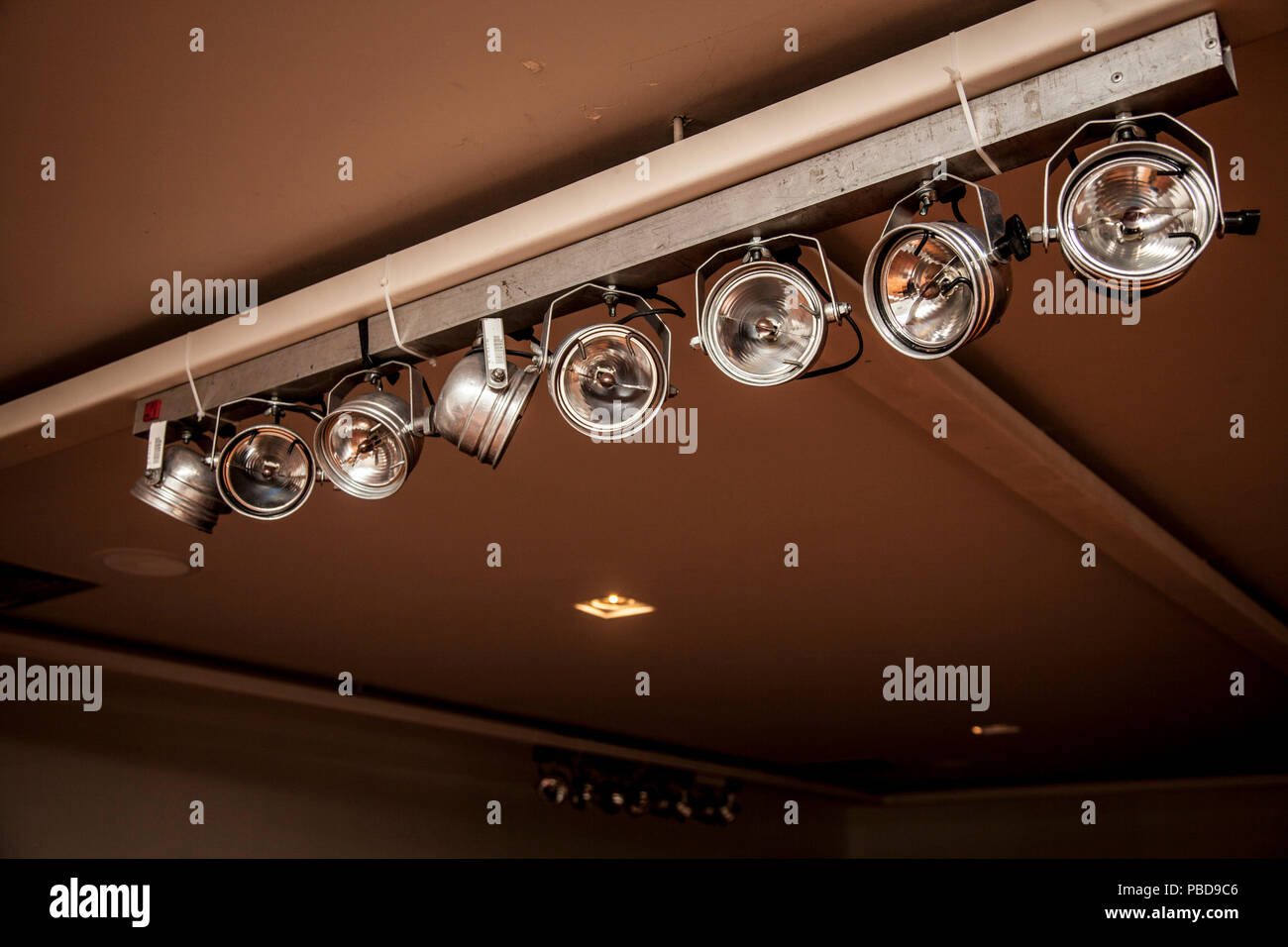 Lighting rail with directional lamps attached to the ceiling Stock ...