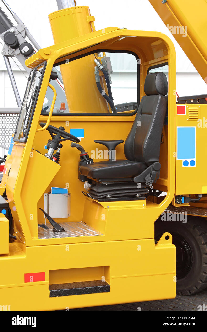 Yellow safety cabin for construction crane operator Stock Photo - Alamy
