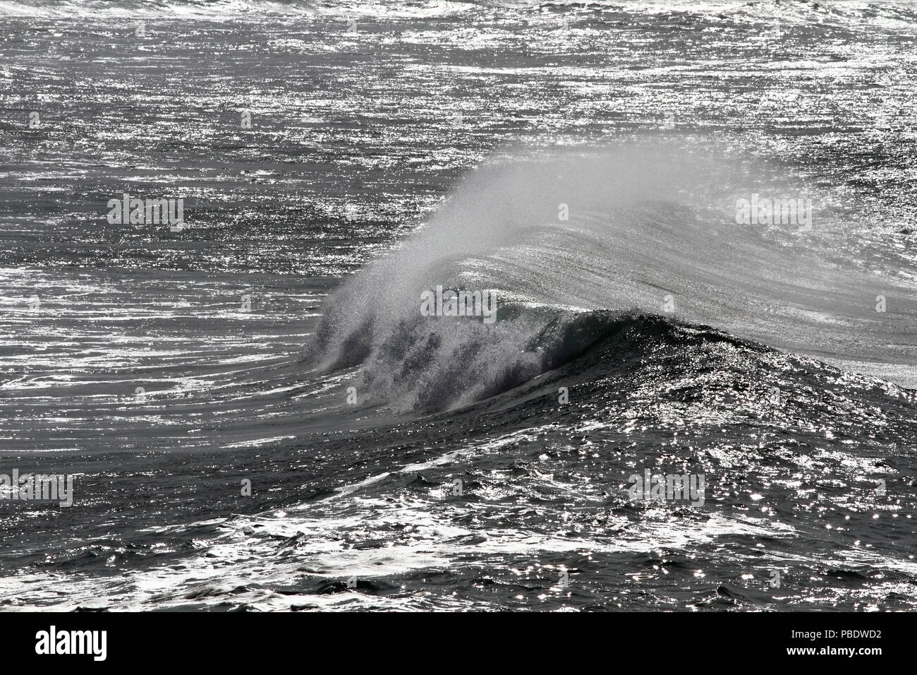Abstract glistening ocean with a windy wave Stock Photo - Alamy