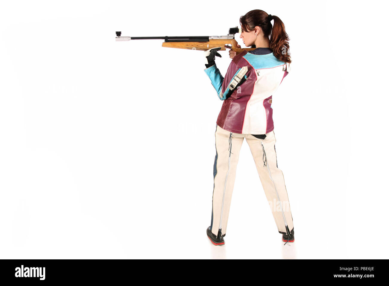 beautiful young woman aiming a pneumatic air rifle Stock Photo - Alamy