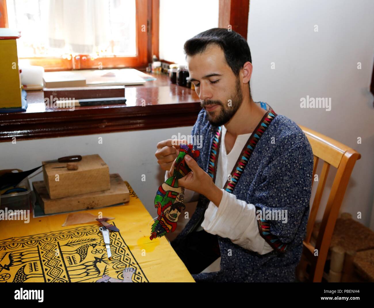 Ankara, Turkey. 25th July, 2018. An artist makes the puppet of ...